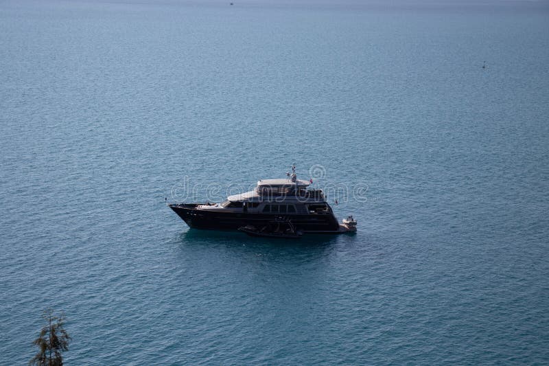 A Yacht in the Middle of the Sea, a View of a Beautiful Yacht and ...