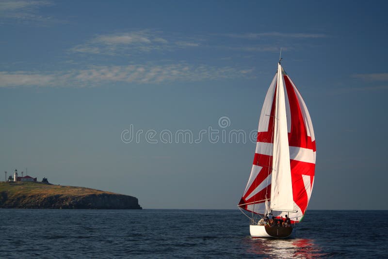 The Yacht with a Red Sail Near Island. Stock Image - Image of calm ...