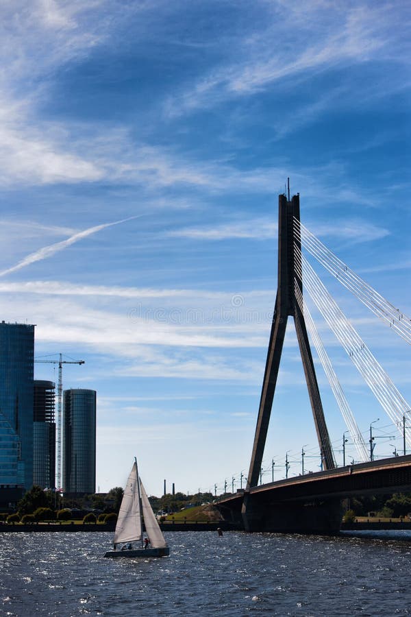 The Yacht with a Sail at the Cable-stayed Bridge in Riga Stock Image ...