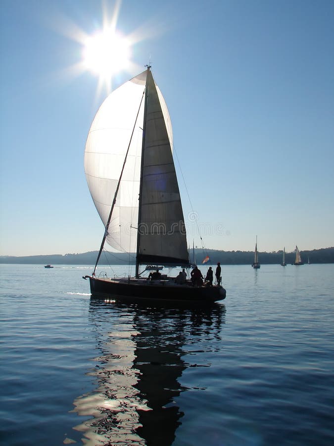 Yacht sailing on calm sea stock photo. Image of regatta - 4199916