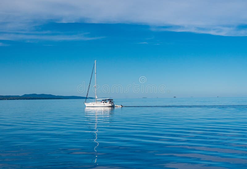 Yacht Sailing Peacefully Across Lake Champlain Stock Photo - Image of ...