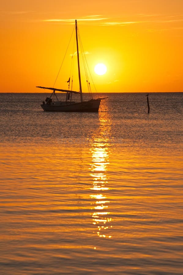 Yacht sailing at sunset stock image. Image of peaceful - 15334395
