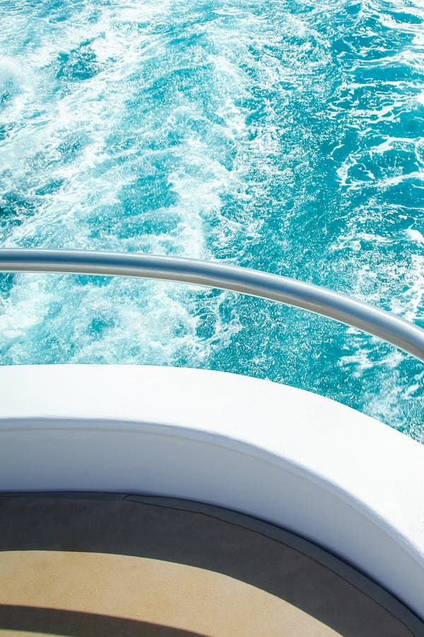A Yacht at Sea from the Deck Rest in the Ship on the Water Background ...