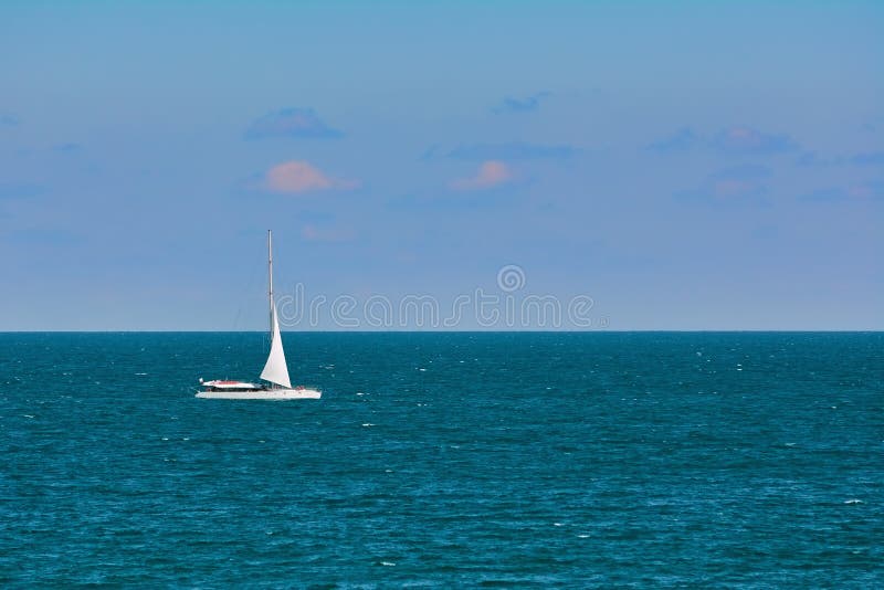 Yacht in the Sea stock photo. Image of triangular, boat - 73966526