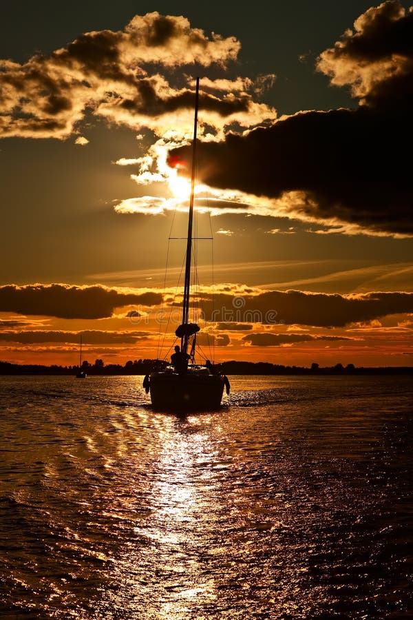 Yacht at sunset. stock image. Image of boat, coast, water - 15214769