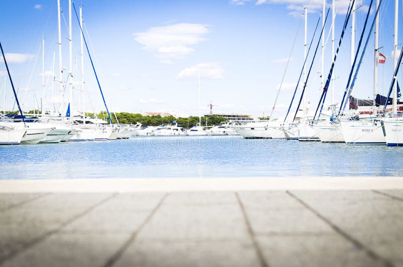 Yachts at dock stock photo. Image of docket, pier, sailboats - 84960206
