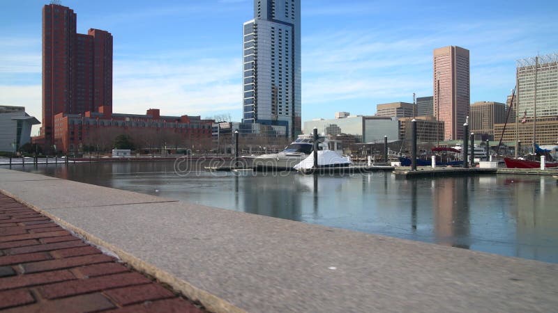 Yachts Reflected in the Frozen Water of Baltimore S Inner Harbor. Stock ...