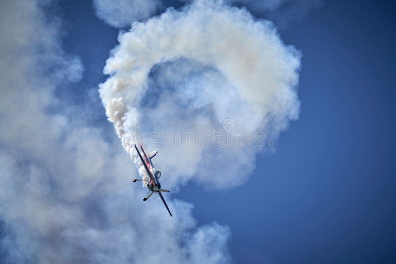 A Yak-55M Single-engine Propeller Aircraft in Flight Against a Clear ...
