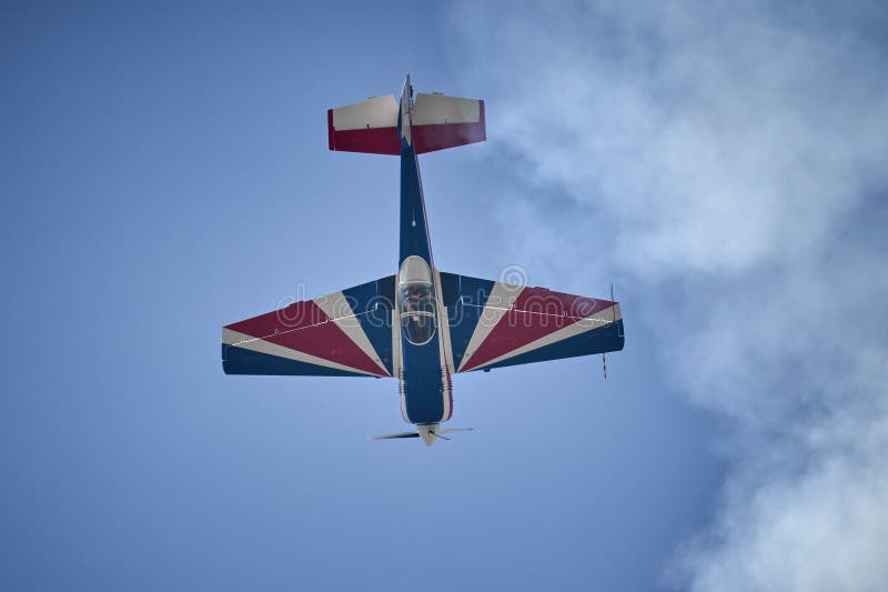 A Yak-55M Single-engine Propeller Aircraft in Flight Against a Clear ...