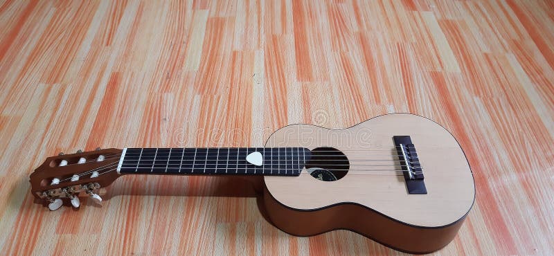 Yamaha Guitalele stock photo. Image of guitalele, miniguitar - 202113458