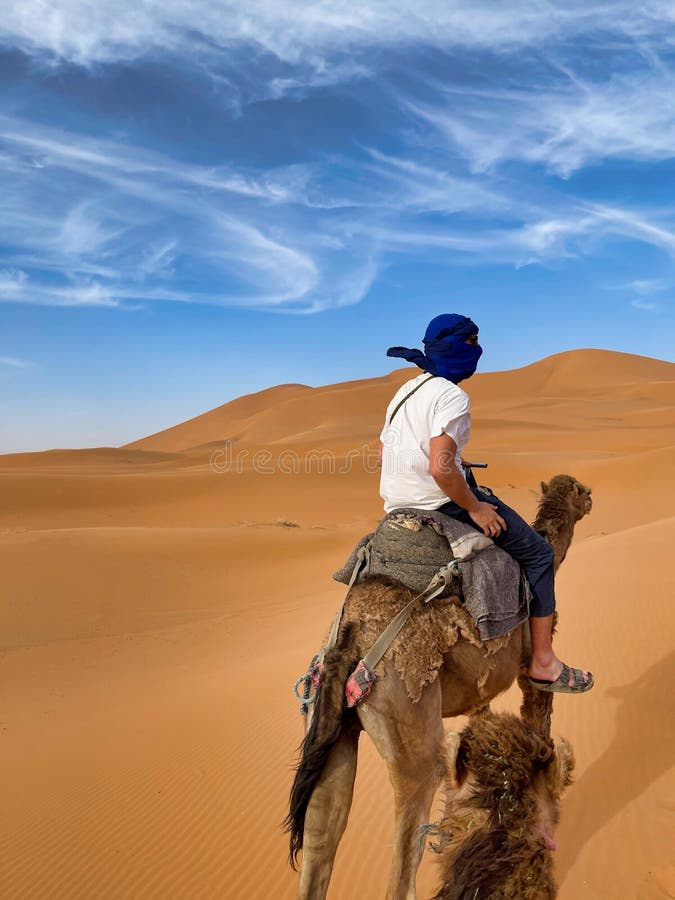 Yang Man on a Camel Doing Ride in Erg Chebbi Desert Stock Image - Image ...