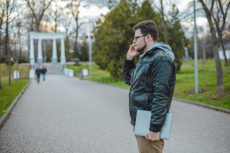 Yang Man on the Phone with Laptop Stock Photo - Image of internet, cell ...