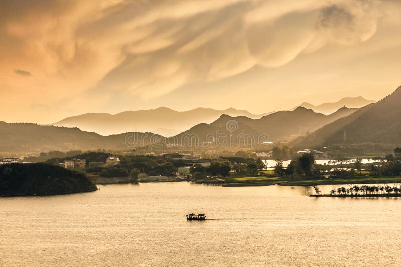 Yanqi lake at sunset stock image. Image of silhouette - 53053529