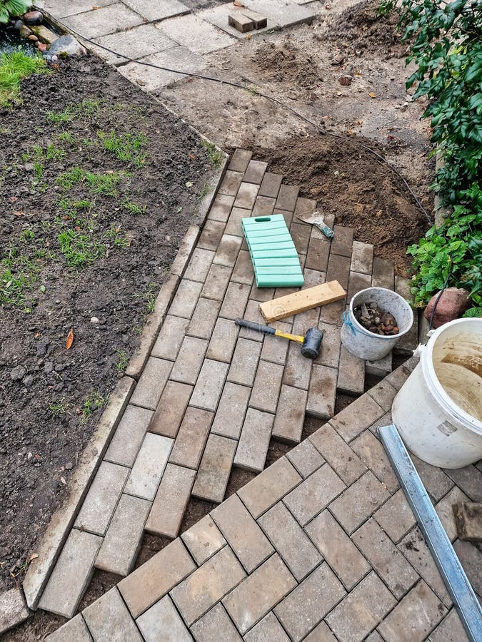 Yard Paving and Some Tools. Unfinished Work Stock Image - Image of ...