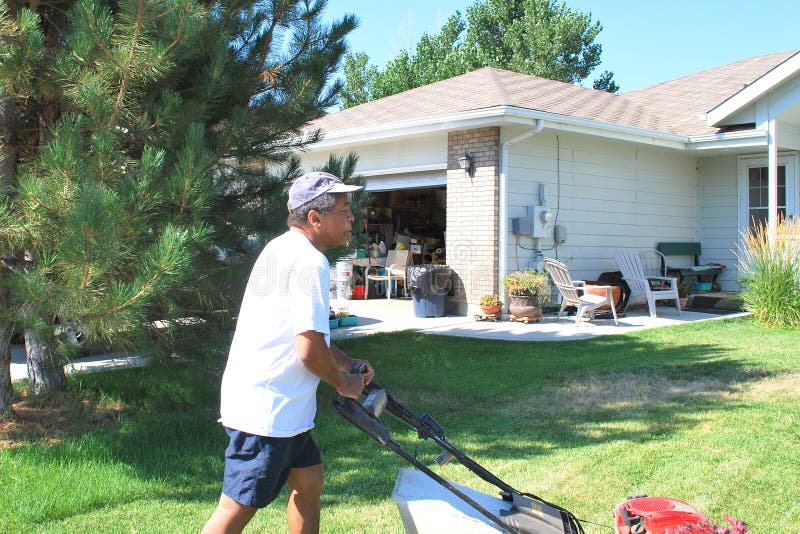 Boy doing yardwork stock photo. Image of help, rake, youth - 2256344