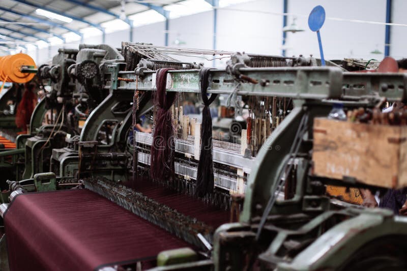 The Yarn is Being Woven in the Textile Factory Stock Photo - Image of ...