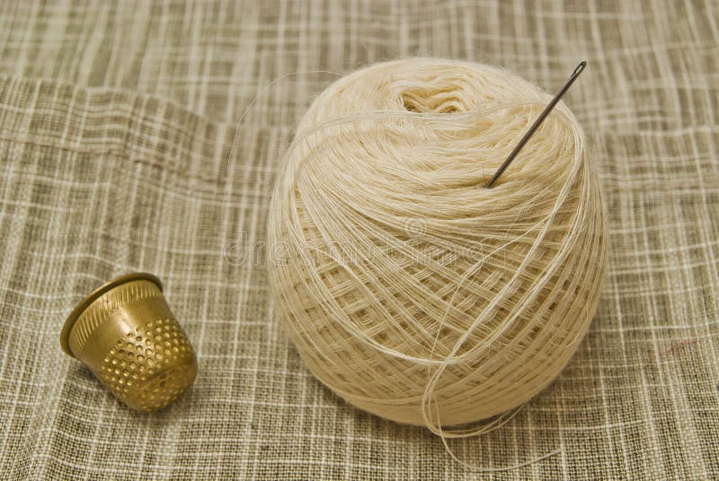 Yarn with Needle and Thimble Stock Photo - Image of bobbin, string ...