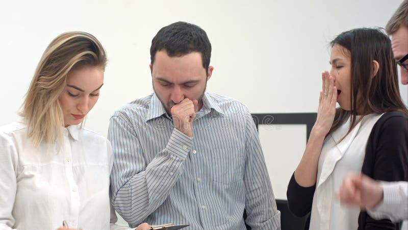 Yawning Office Workers Getting Tired after Long Discussion Stock Photo ...