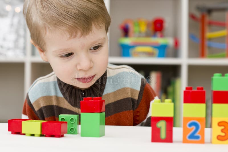 2 Year Old Boy Stacking Duplo Blocks. Stock Photo - Image of graph ...