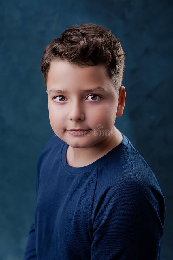 10 Year Old Boy, Studio Portraint on Blue Background Stock Image - Image of young, professional ...