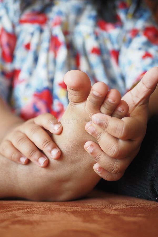 6 Year Old Child Suffering Pain on Feet Stock Photo - Image of painful ...