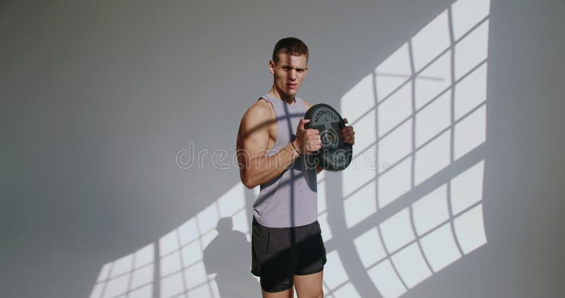 Athletic Young Man Performing Strength Training in Studio Stock Video ...