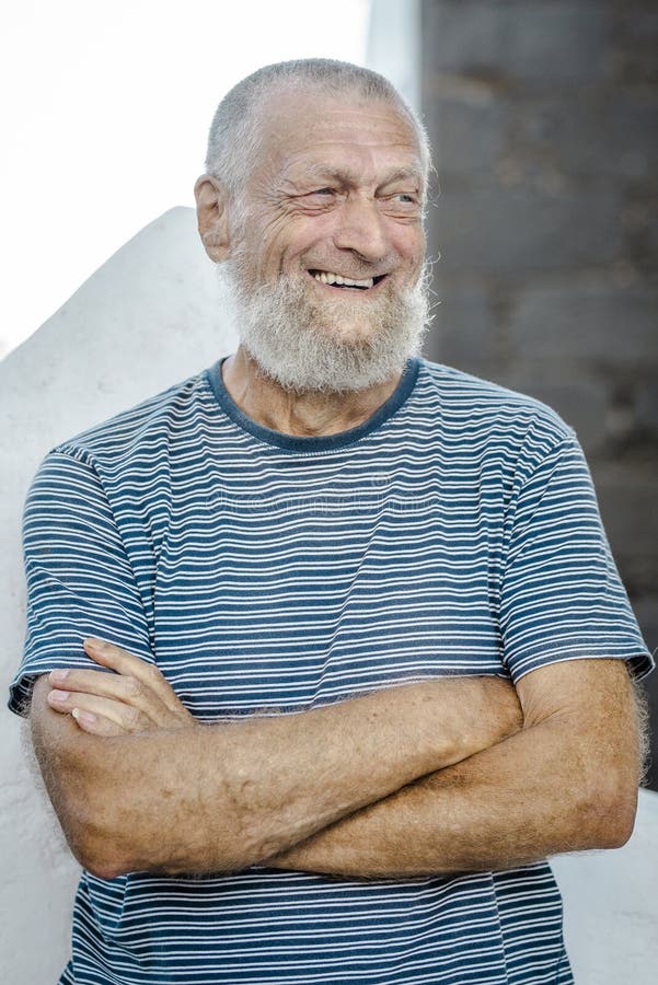 75 Year Old Senior Man Laughs while Having a Good Time Outdoors Stock ...