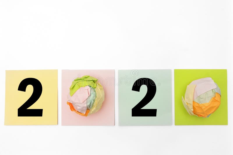 Year 2020 Sign on Post-it Note and Paper Balls Stock Image - Image of ...