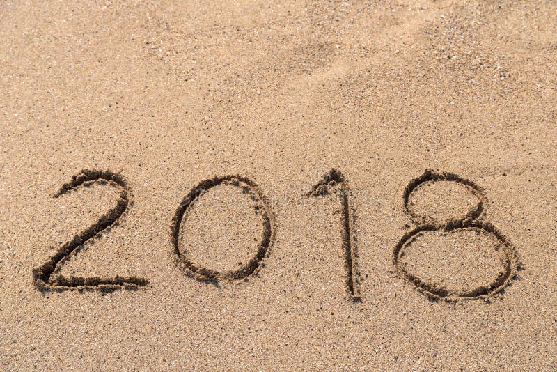 Year 2018 Written on Sand stock image. Image of holiday - 55920139