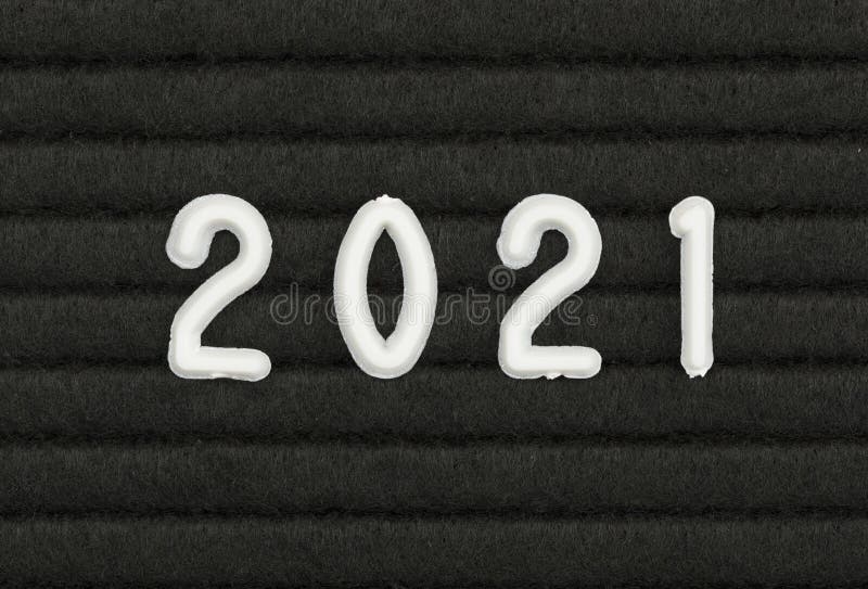 Year 2021 Written with Alphabet Building Blocks, Abacus in Background ...