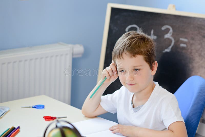 7 Years Old Boy Doing His Homework Stock Image - Image of homework ...