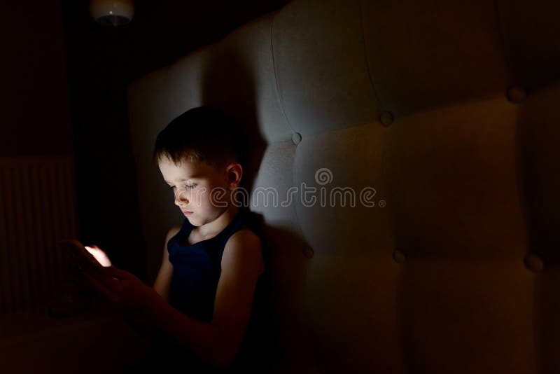 7 Years Old Child Boy Using Smartphone at Night Stock Image - Image of ...
