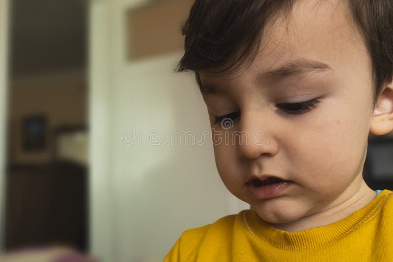 3 Years Old Cute Turkish Baby Staring Down Stock Photo - Image of ...