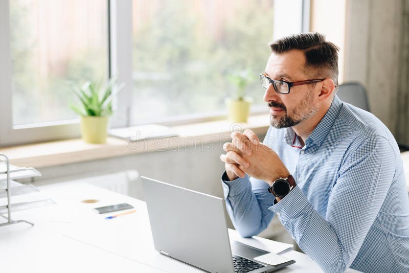 Middle Aged Handsome Man Working on Laptop Computer Stock Photo - Image ...