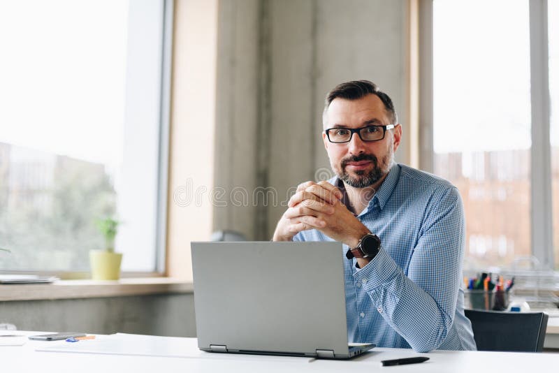 Middle Aged Handsome Man Working on Laptop Computer Stock Image - Image ...