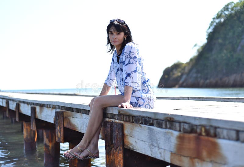 45 Years Old Russian Woman Standing In Japanese Sea And Looking Away
