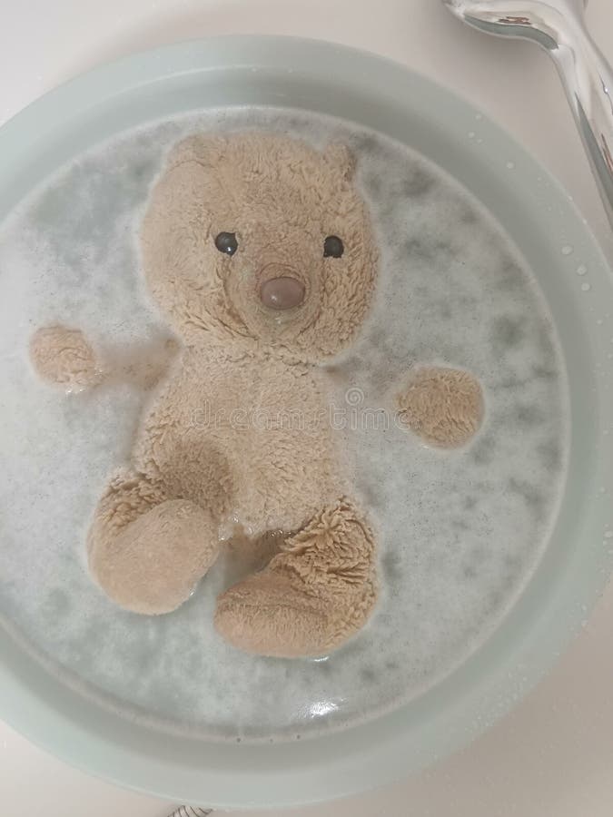 Teddy bear taking a bath stock image. Image of bubble - 124231707