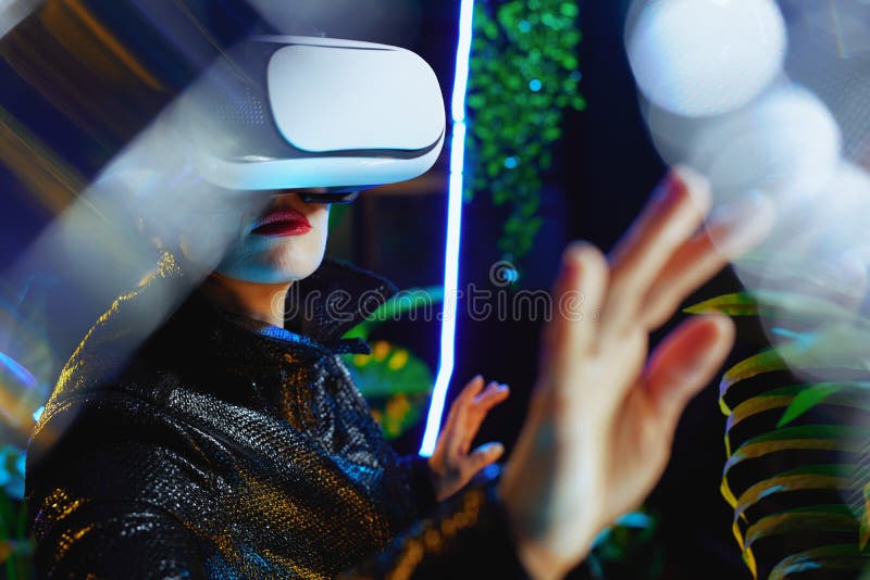 40 Years Old Woman in Metaverse in Vr Goggles Exploring Stock Photo ...