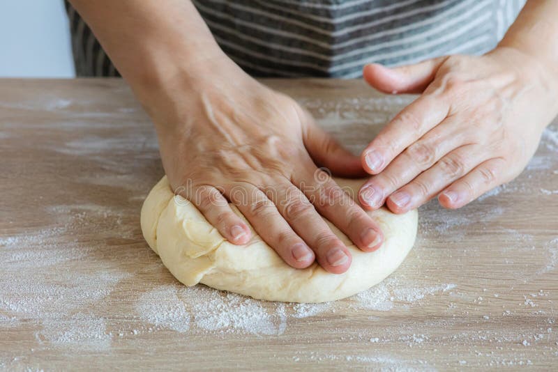 Yeast dough and human arms stock photo. Image of cook - 189106178