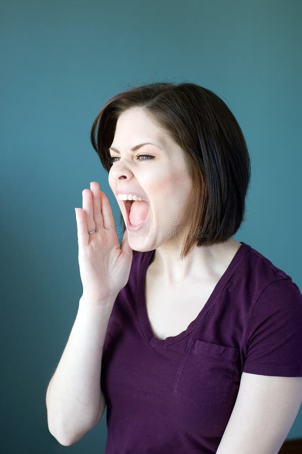 Woman yelling at herself stock photo. Image of judge - 19731930