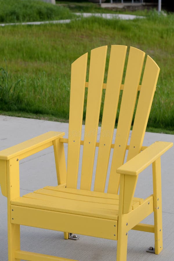 Yellow Adirondack Chair at the Beach Stock Photo - Image of vacation ...