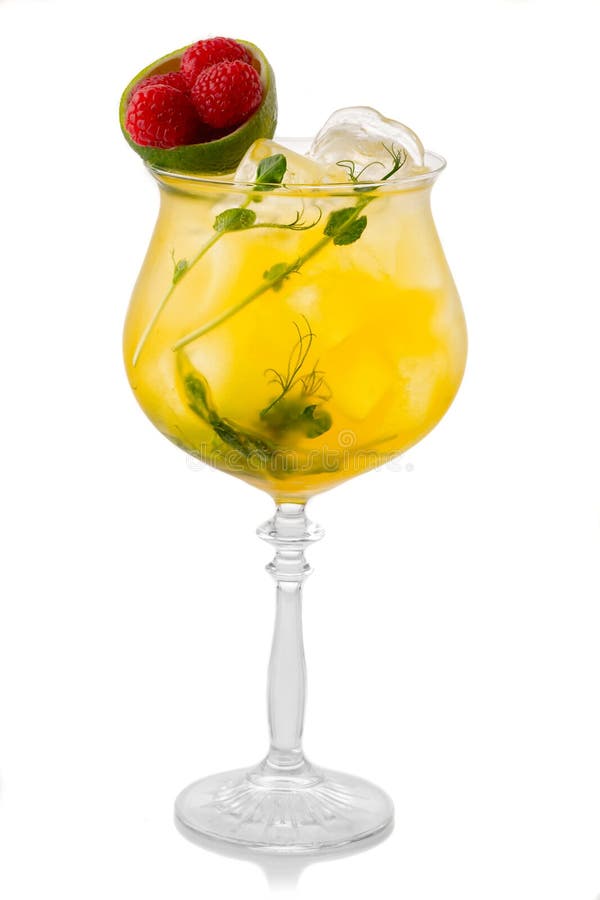 Yellow Alcohol Cocktail with Fruit Ice Crush and Carambola Slice Stock ...