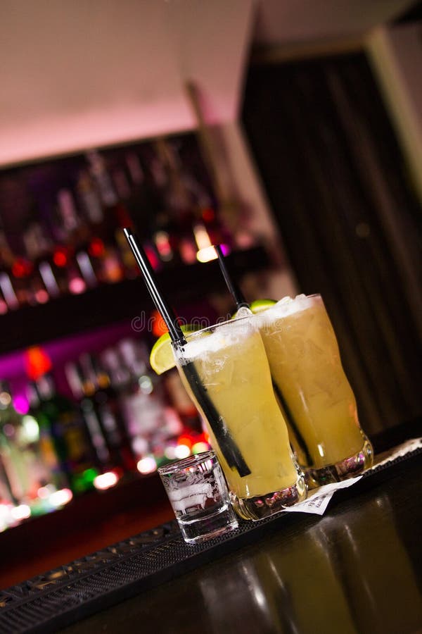 Yellow alcoholic cocktail stock photo. Image of alcohol - 70118946