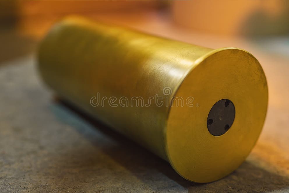 Yellow Artillery Shell Casing Close-up Stock Image - Image of copper ...