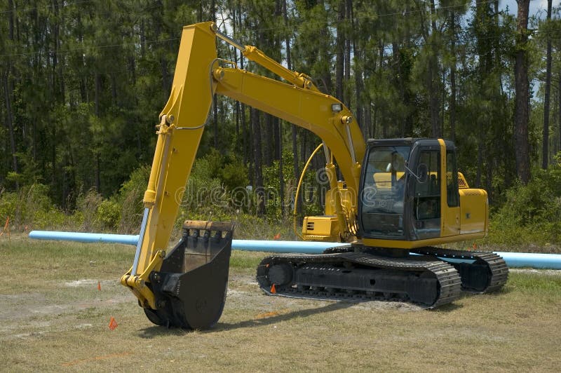 Yellow back hoe. stock image. Image of pipeline, yellow - 818889