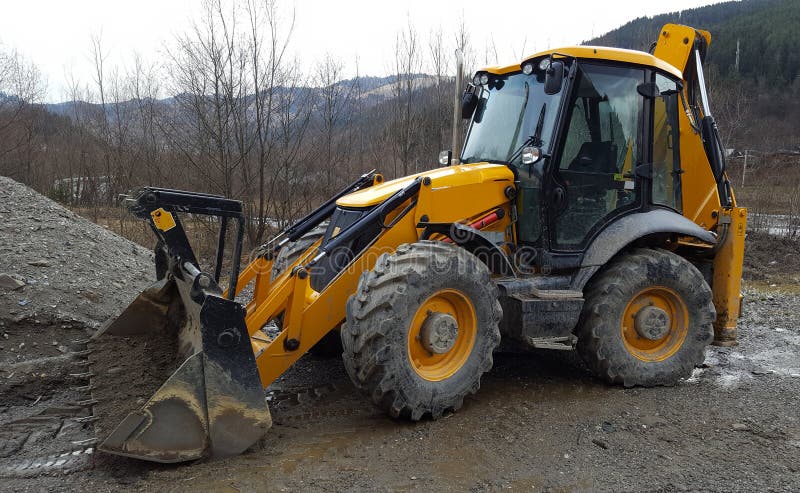 Yellow Backhoe on Construction Site Stock Image - Image of activity ...
