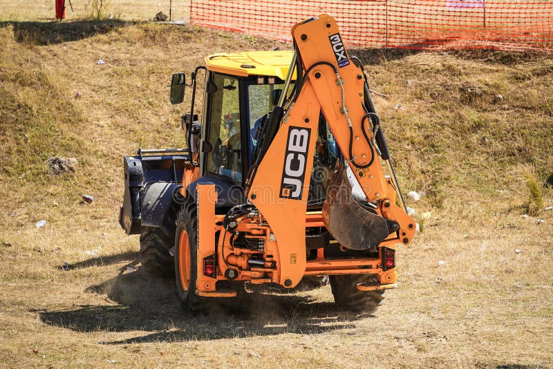 Yellow Backhoe loader editorial photo. Image of ground - 355110146