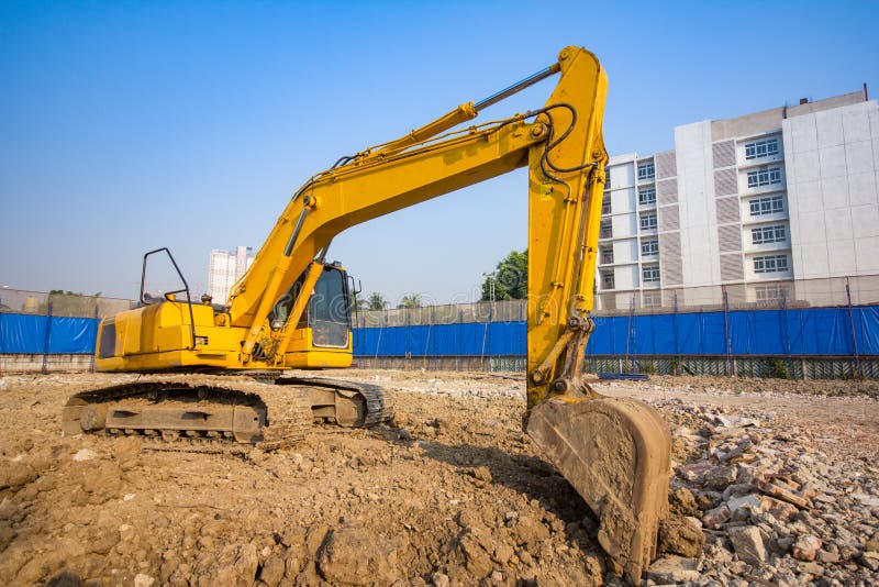 Yellow Backhoe Loader on Construction Site and Work Stock Photo - Image ...