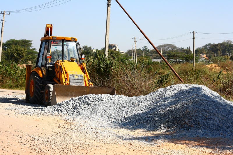 Yellow Backhoe Loader in Road Construction Stock Image - Image of ...