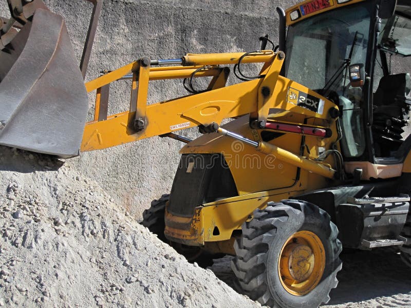 Yellow JCB 3CX Backhoe Loader Moving Gravel in Quarry Editorial Stock ...